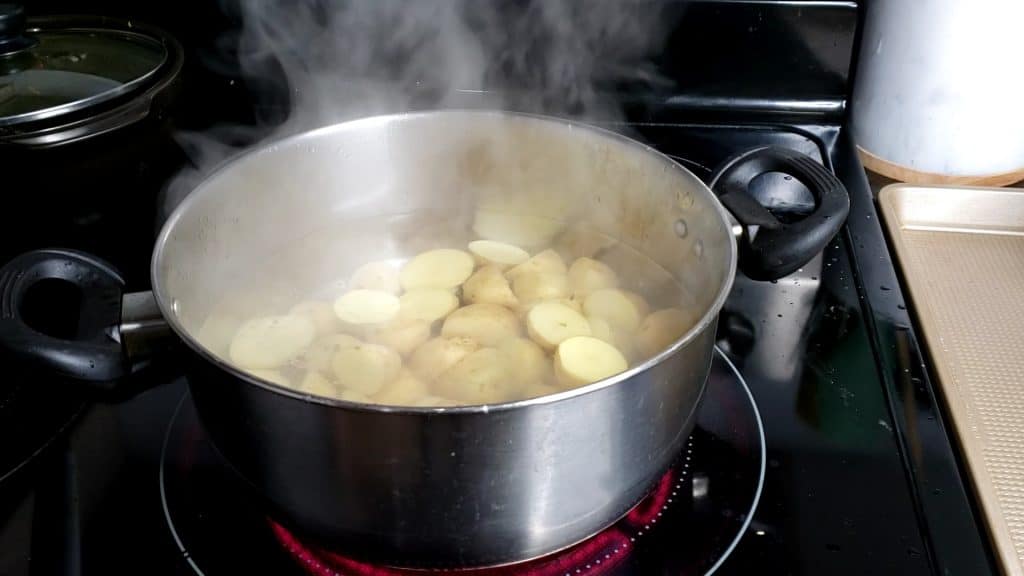 Roasted Garlic Butter Parmesan Potatoes - Cooking With Claudy